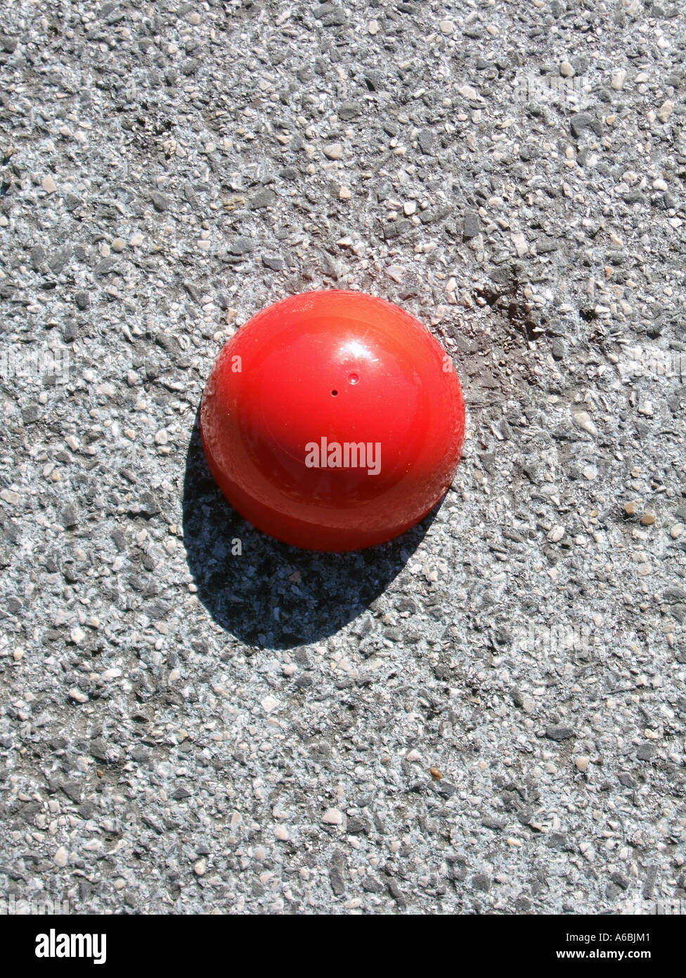 red skittle on road Stock Photo - Alamy