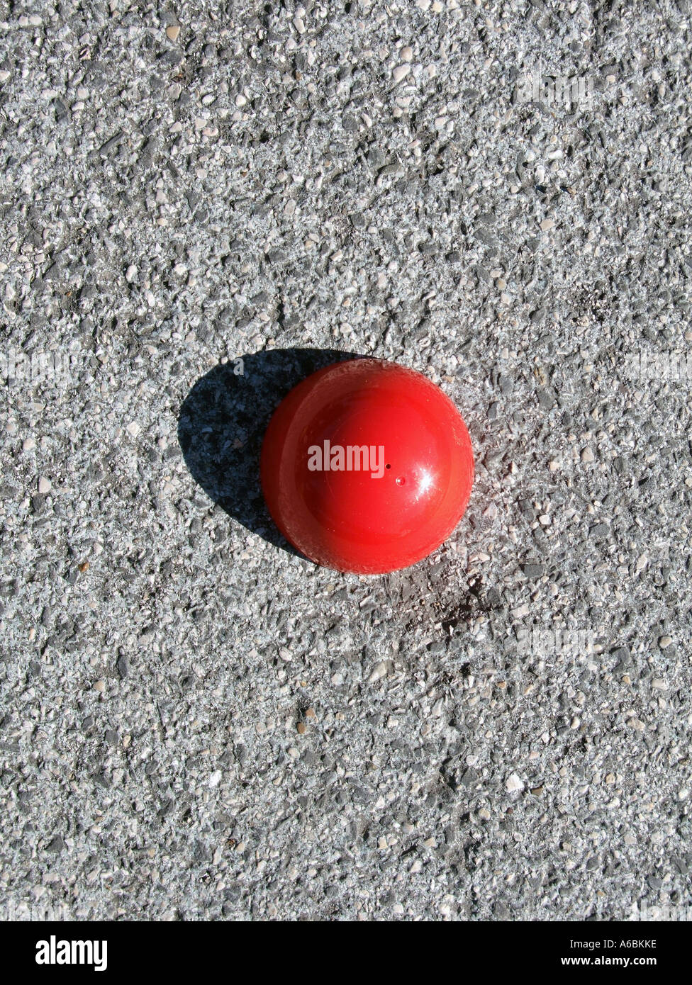 red skittle on road Stock Photo - Alamy
