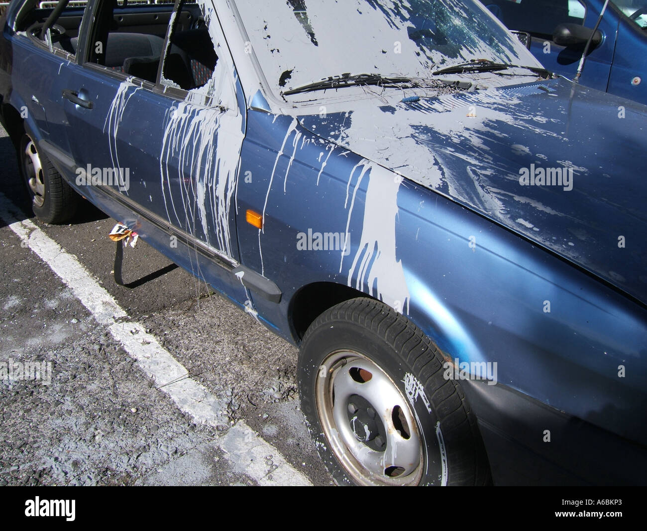 vandalised car covered with paint Stock Photo - Alamy