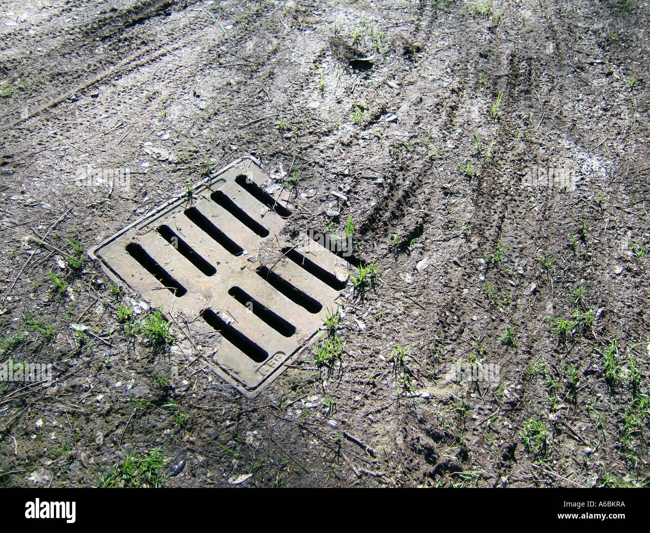 water drain in muddy field Stock Photo - Alamy