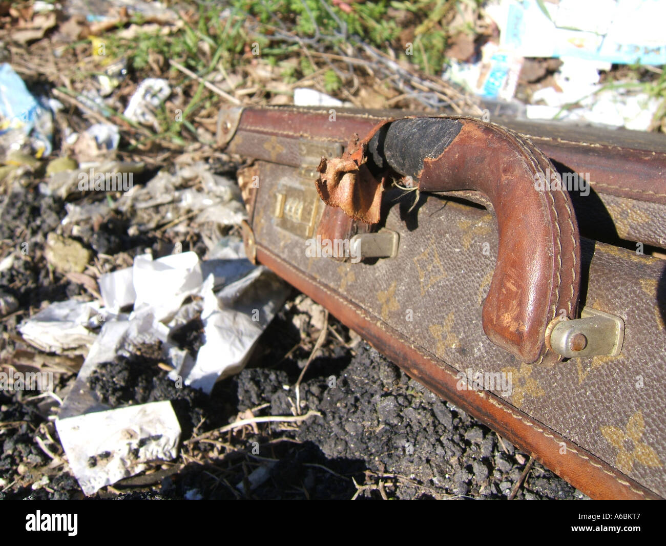 abandoned old damaged briefcase Stock Photo - Alamy