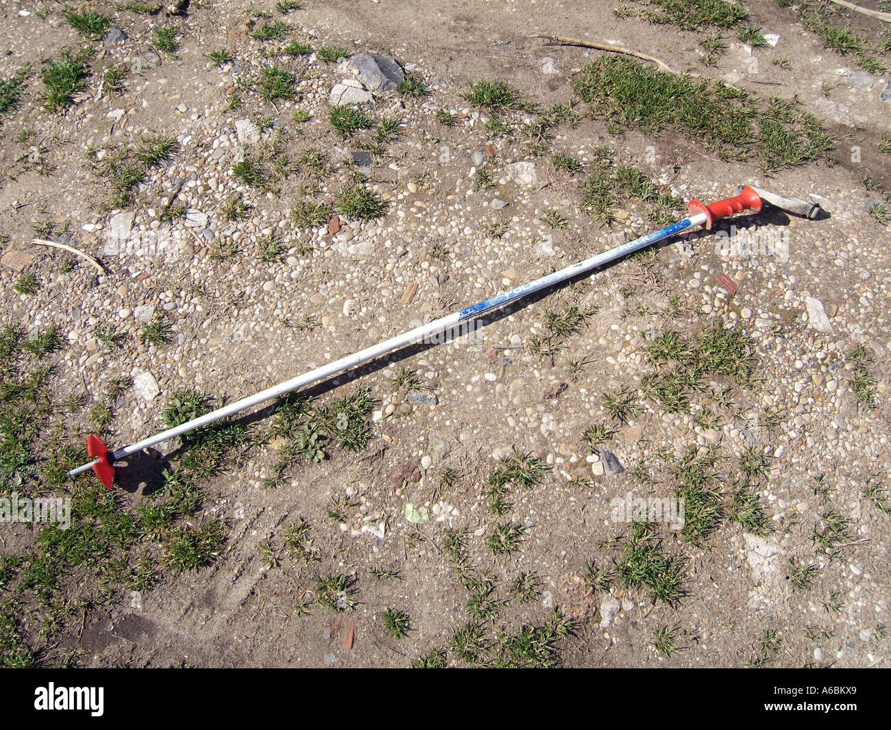 ski pole on derelict ground Stock Photo - Alamy