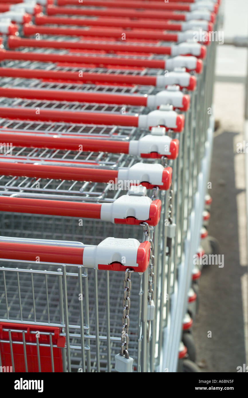 Shopping trolleys stacked up together hi-res stock photography and ...
