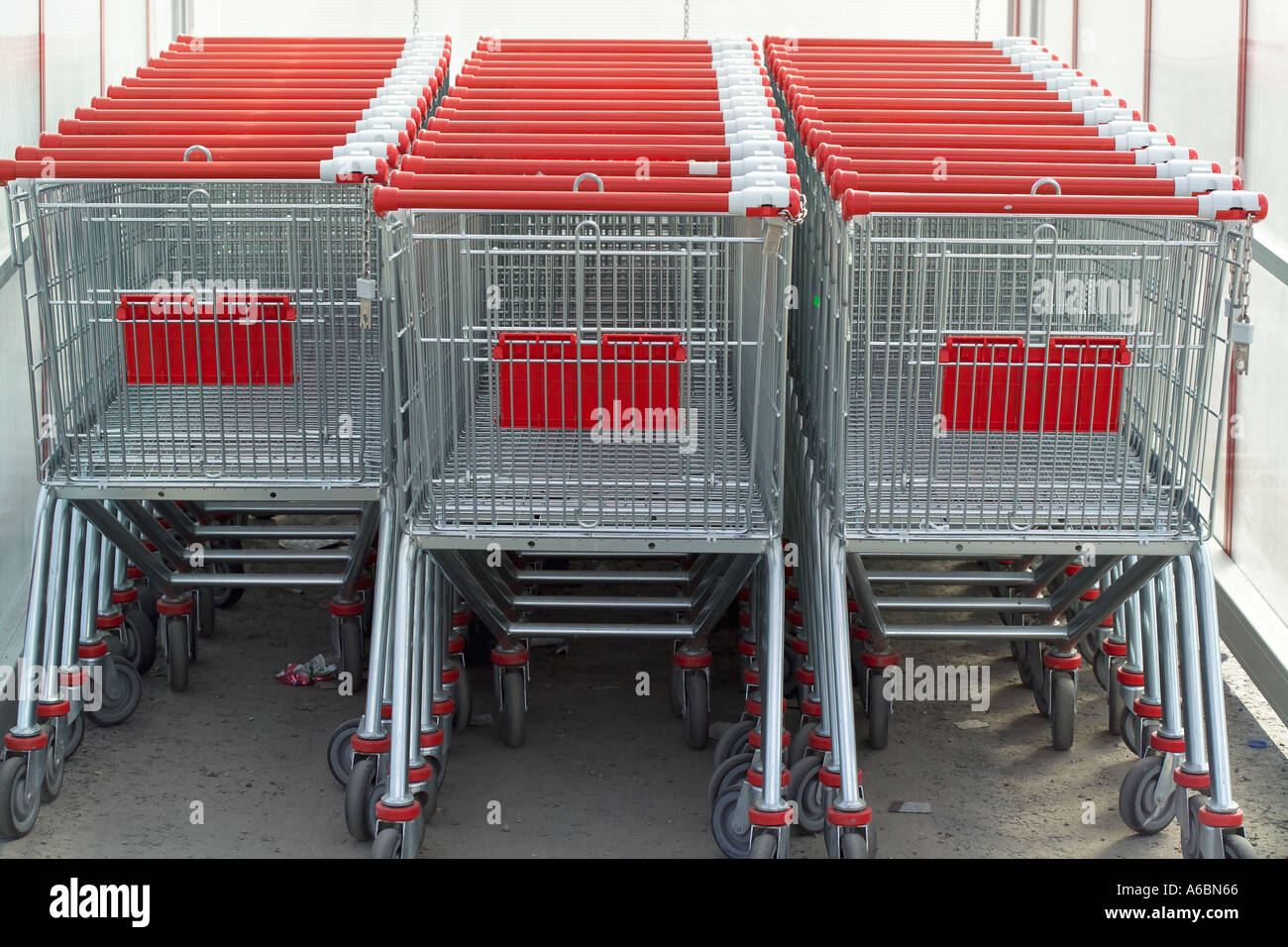 Shopping trolleys stacked up together hi-res stock photography and ...