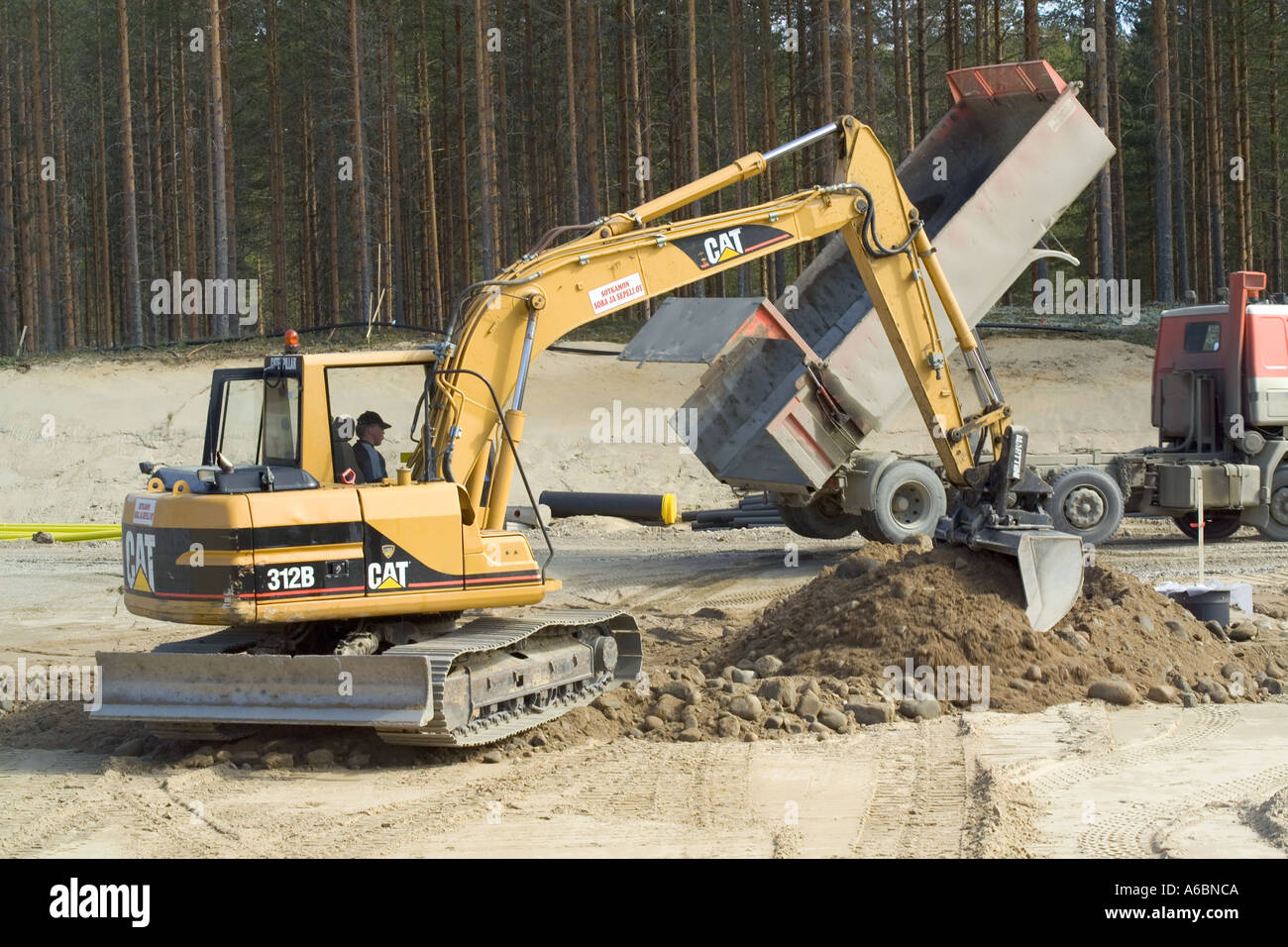 truck and excavator Stock Photo - Alamy