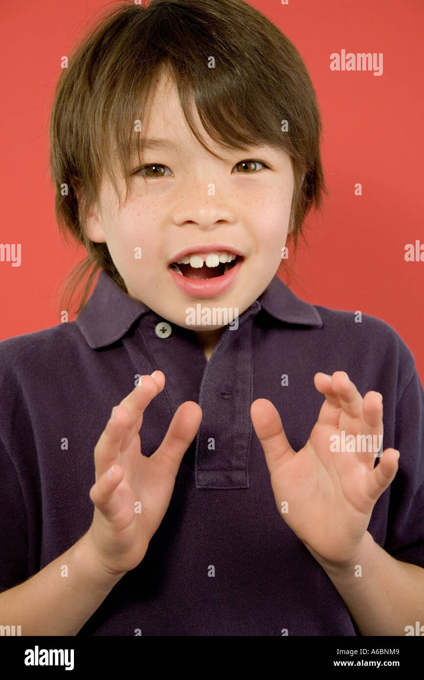 Portrait of Asian boy surprised Stock Photo - Alamy