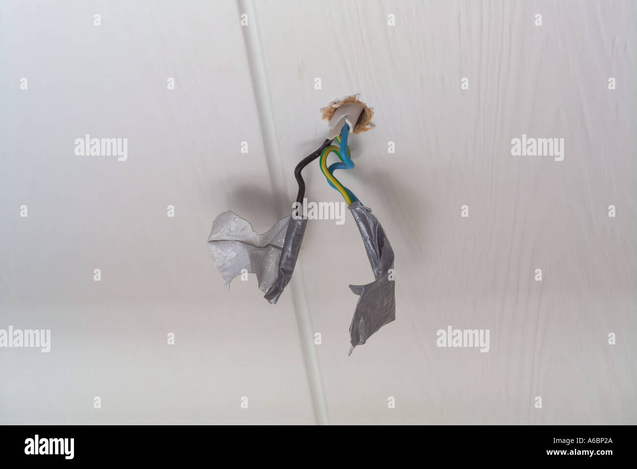 overhead lighting wires Stock Photo - Alamy