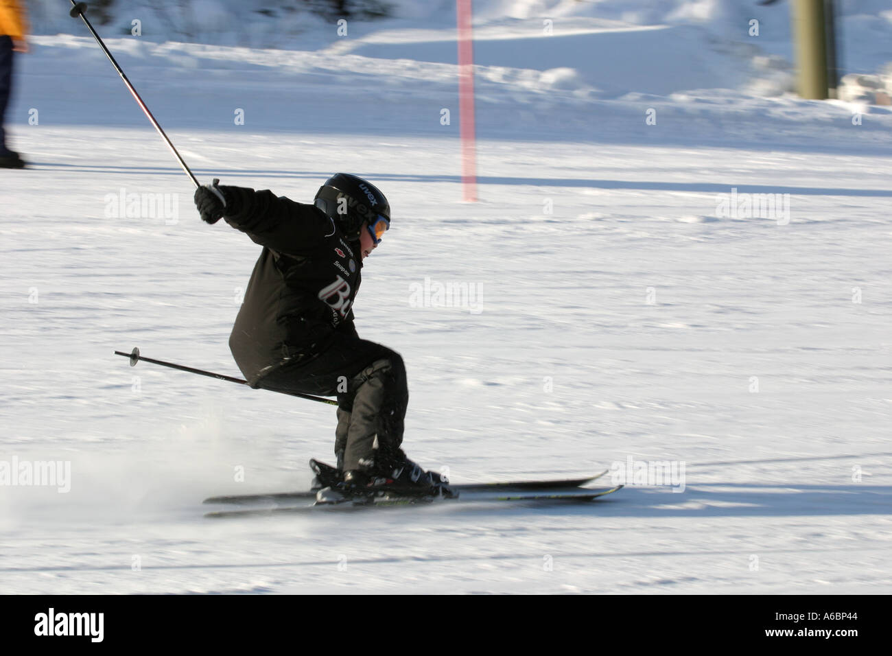skiing child falling over Stock Photo - Alamy