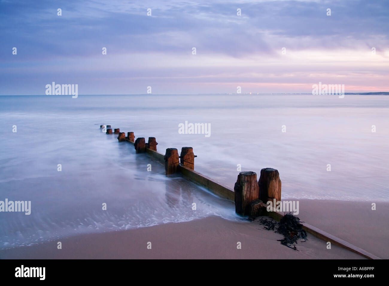 Groins sea defences on the beach at sunset Alnmouth Northumberland ...
