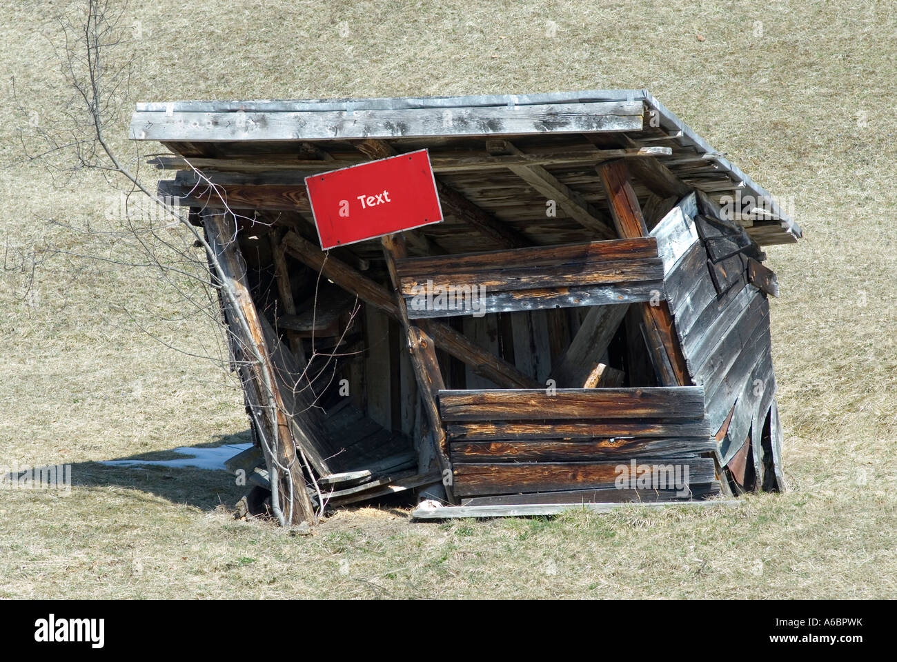 hovel tumbling down with red sign Stock Photo - Alamy