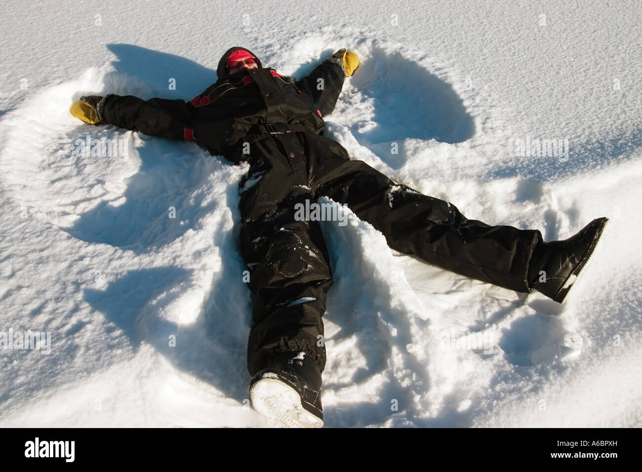 Angel shape in snow hi-res stock photography and images - Alamy