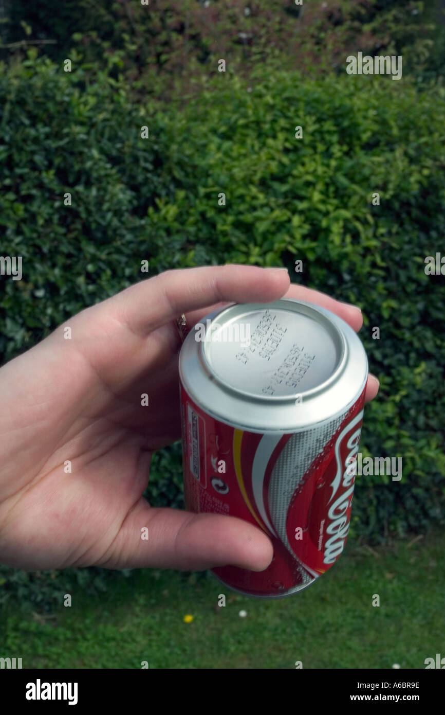hand and fingers of man with can of coca cola symbolize empty Stock ...