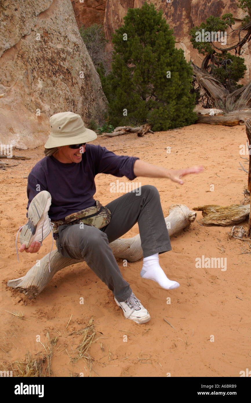 Shoe removing hi-res stock photography and images - Alamy