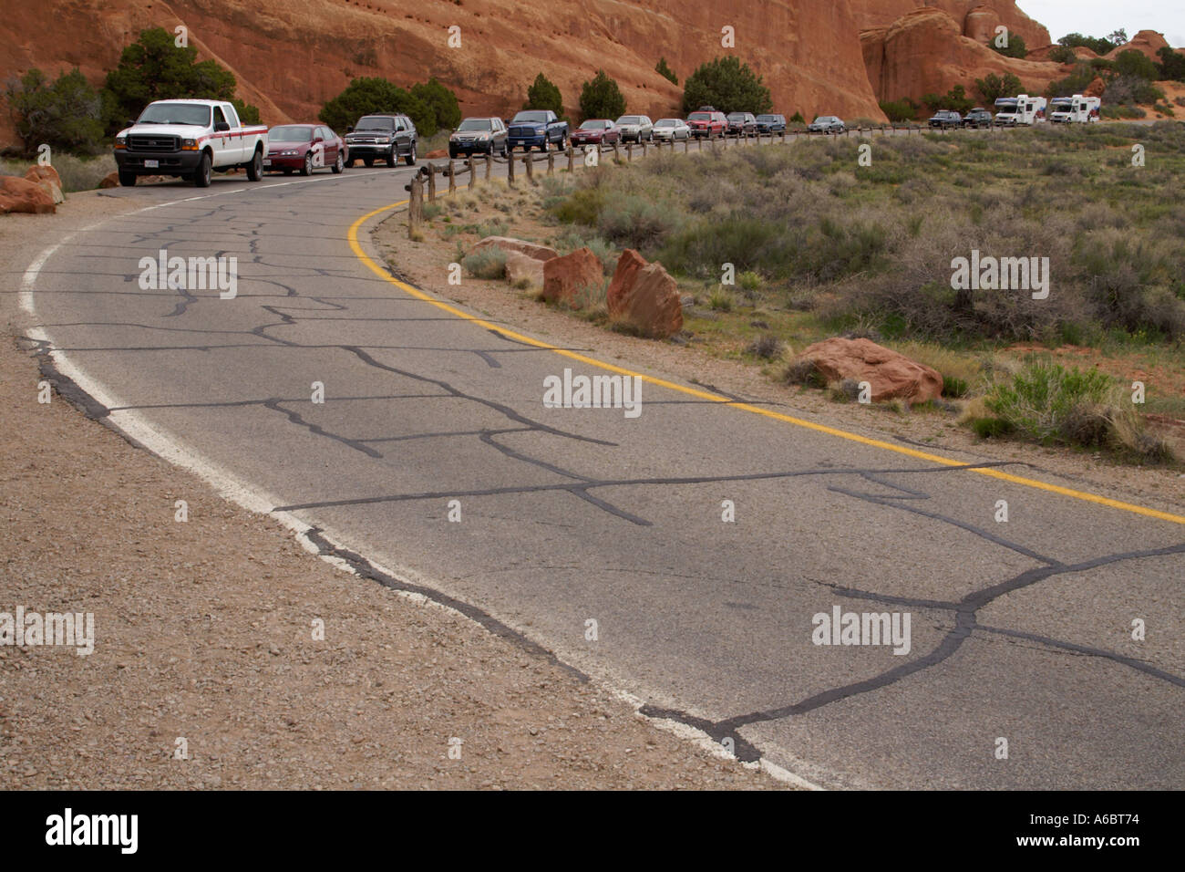 line of parked cars in over flow parking Arches National Park Utah U S ...