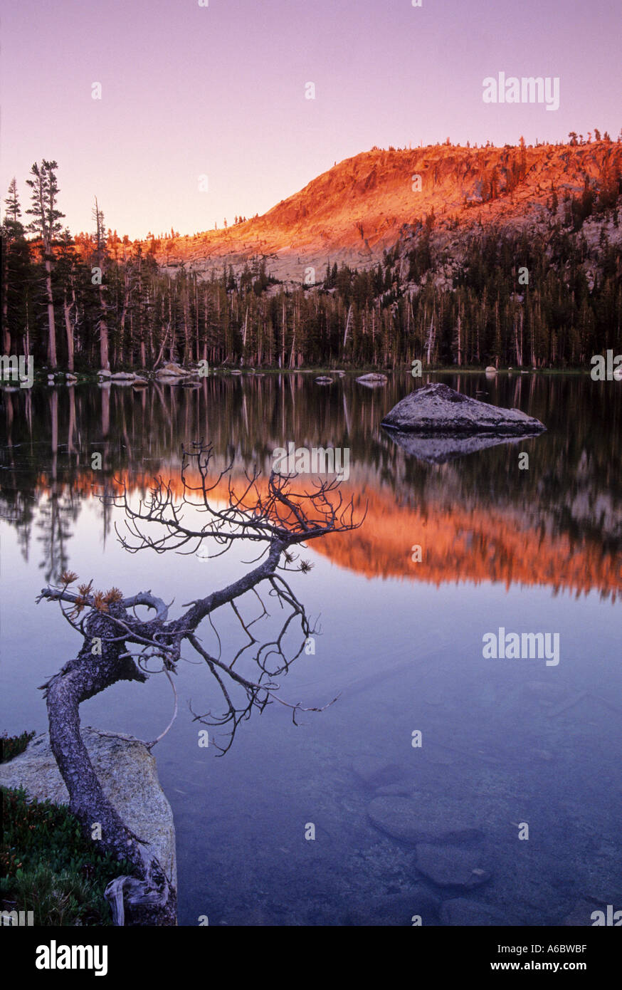 Sunset colors the peak above South Lake in the Dinkey Lakes Wilderness ...