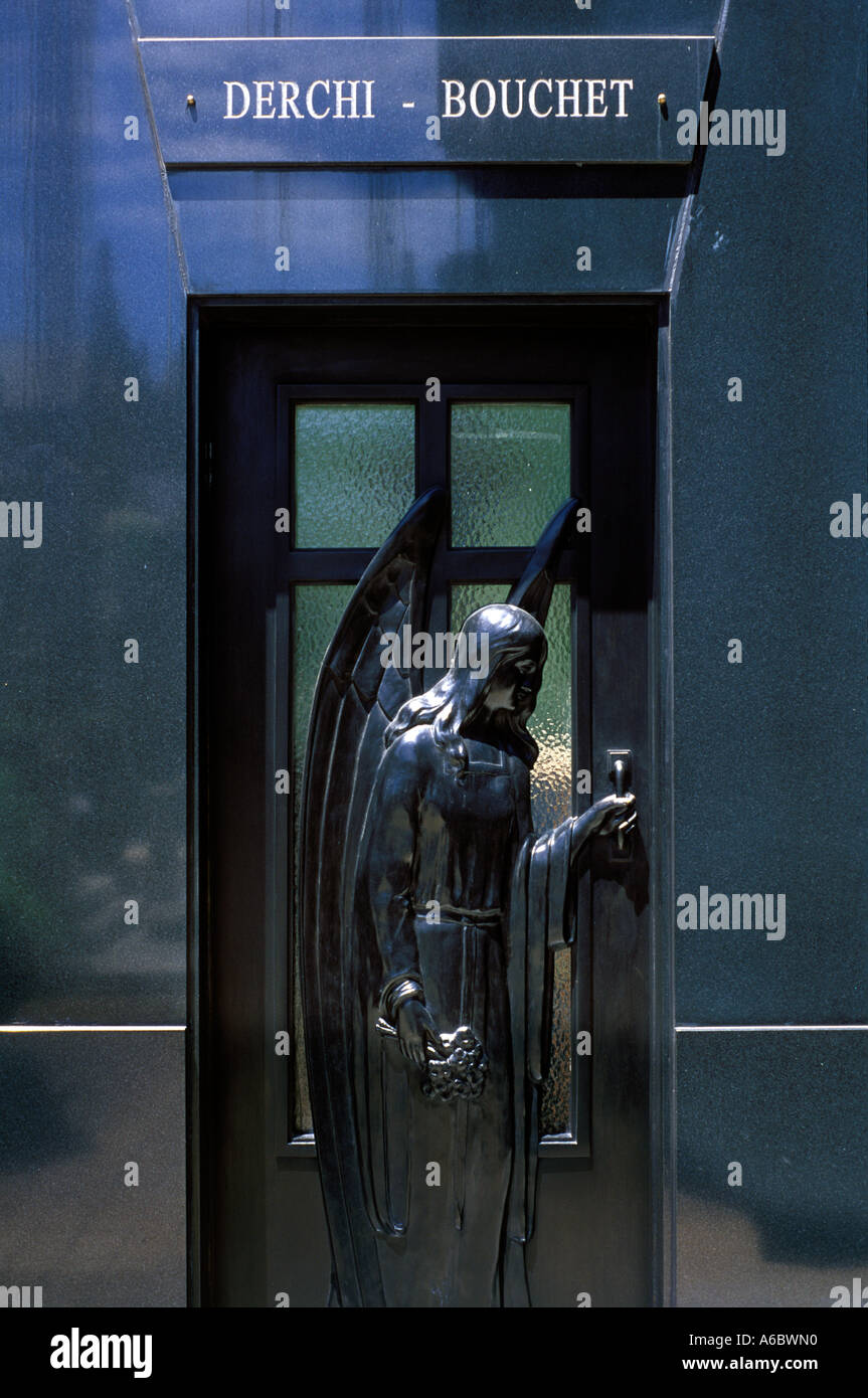 Lavish bronze door of a mausoleums at the Cementario de la Recoleta ...