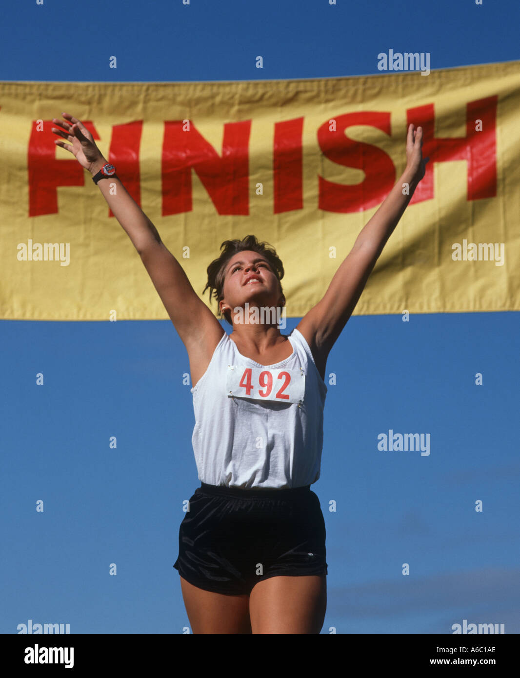woman crossing finish line at track race as winner Stock Photo: 442798 ... woman crossing finish line at track race as winner Stock Photo: 442798 ...