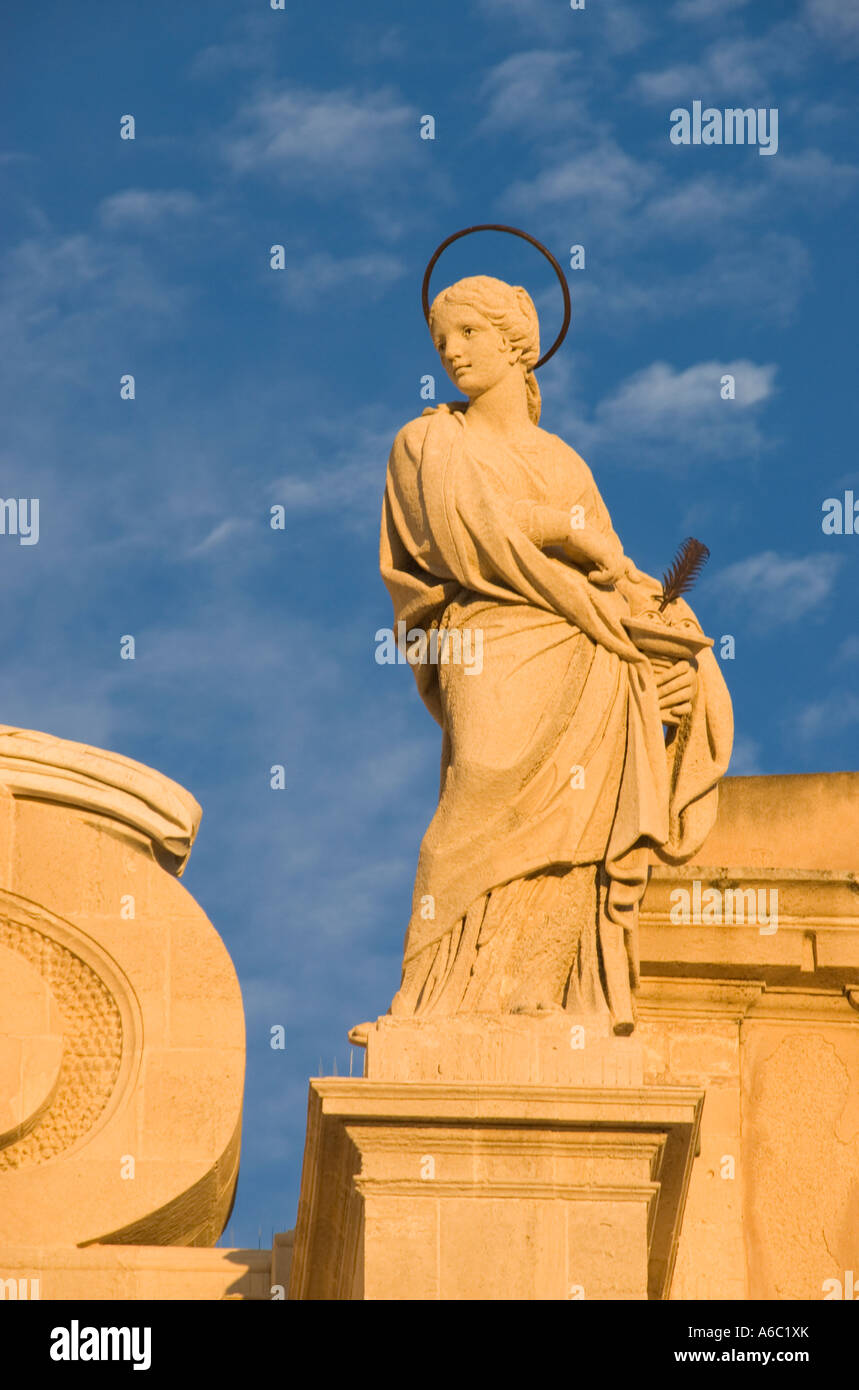 Statue in warm evening sun , Siracusa cathedral, Ortygia, Siracusa ...