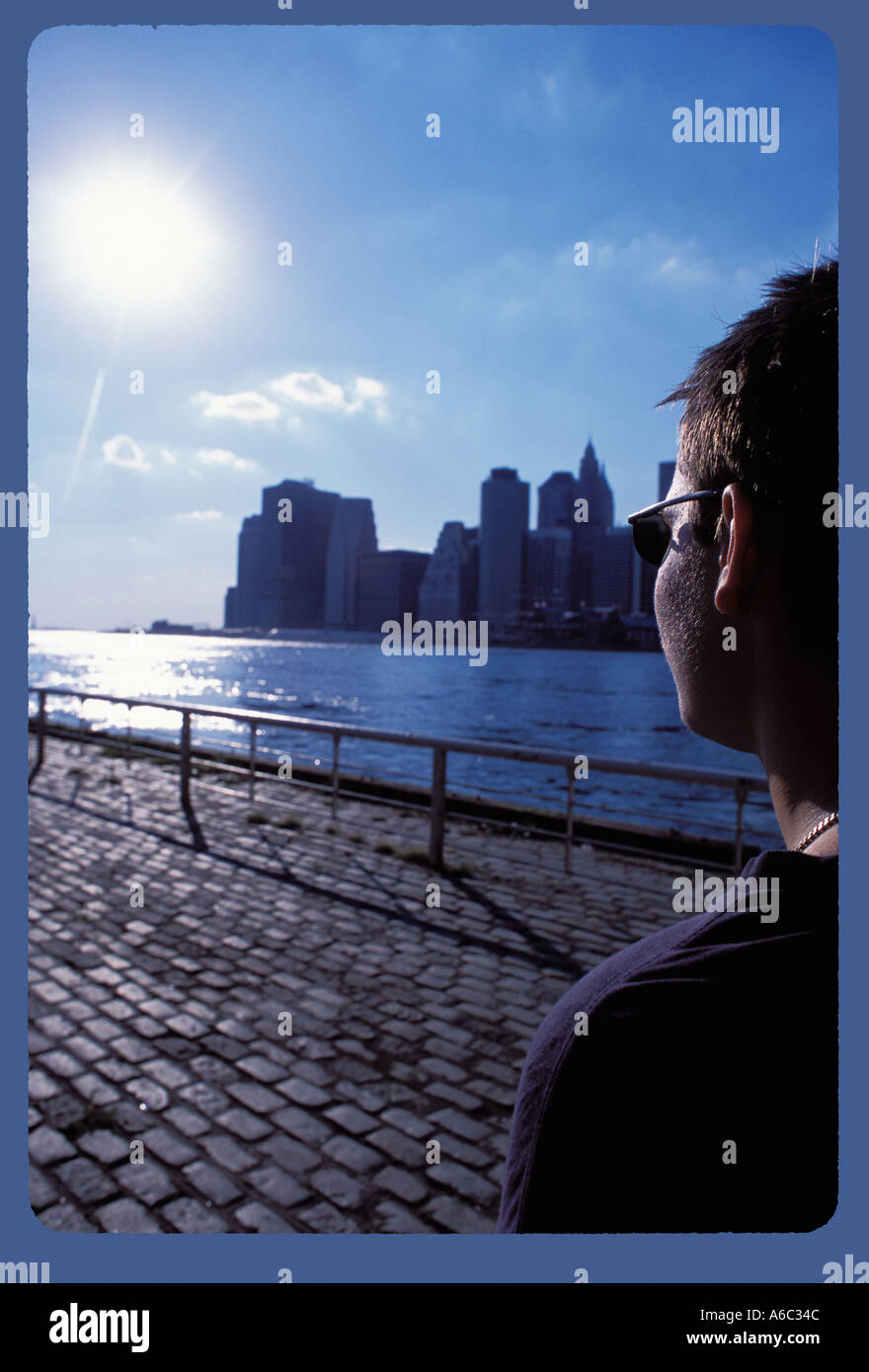 Concept image of young boy looking into future Stock Photo - Alamy