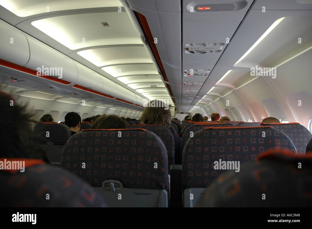 Inside of holiday charter airplane Easy Jet Stock Photo - Alamy