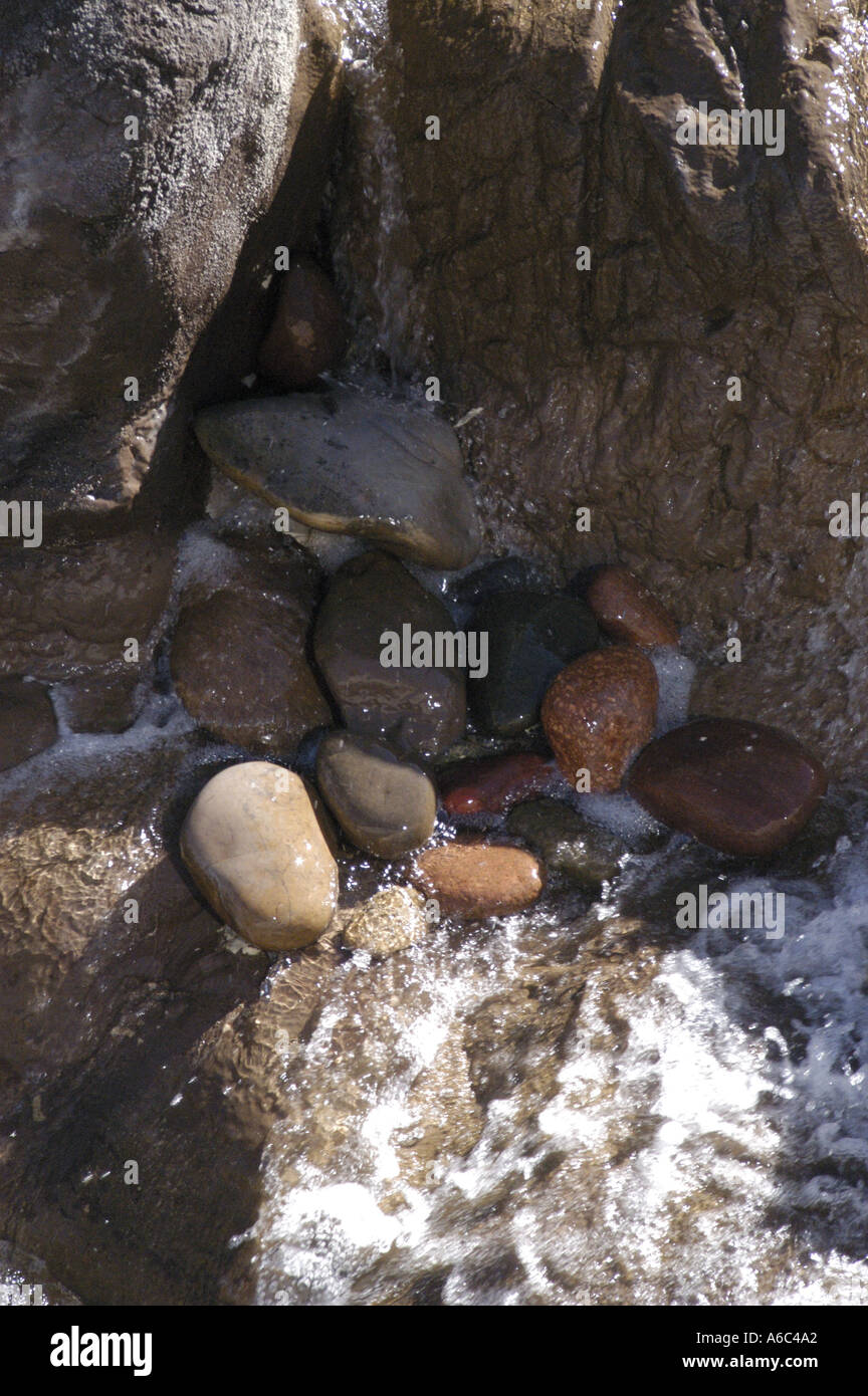 Water falling on stones hi-res stock photography and images - Alamy