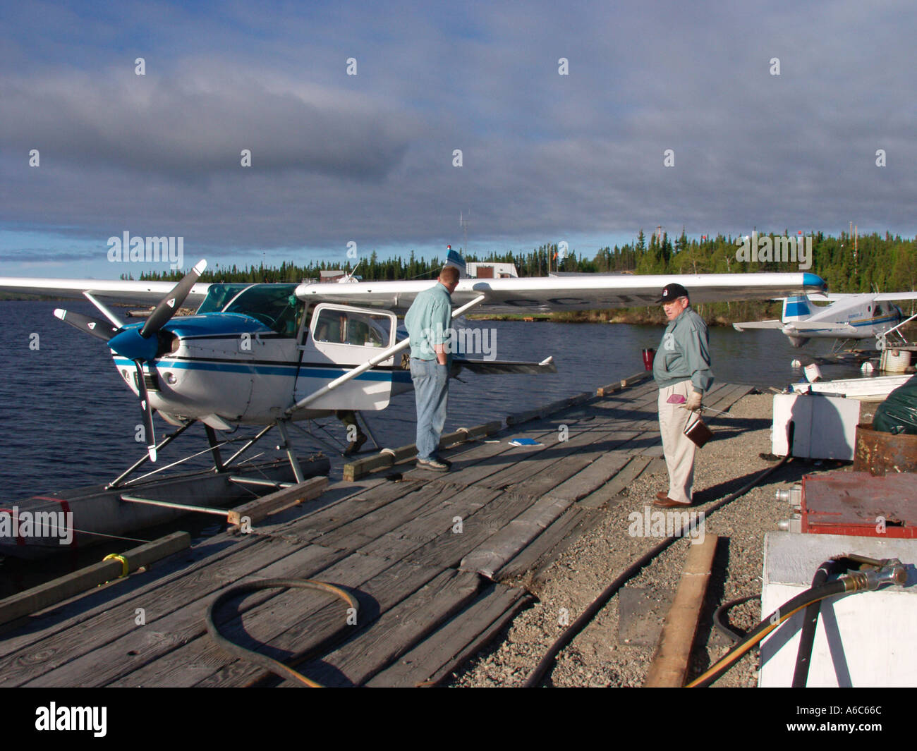 Float plane at dock Stock Photo - Alamy