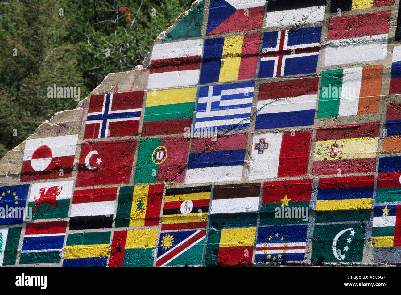 International flags painted on cement wall Stock Photo - Alamy