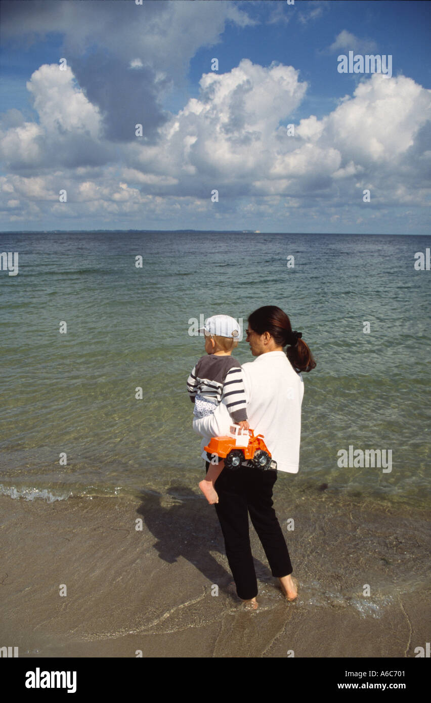 Mother and son on the beach Stock Photo - Alamy
