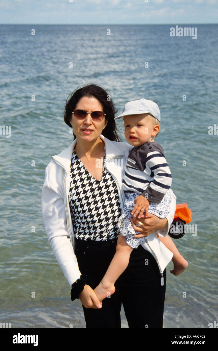 Mother and son on the beach Stock Photo - Alamy