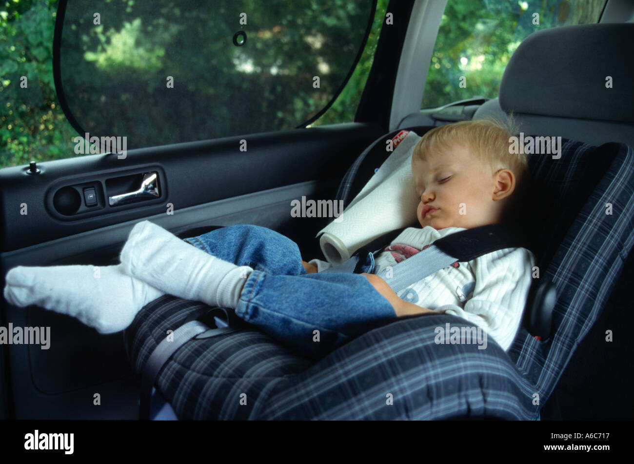 Sleeping boy in the car Stock Photo - Alamy
