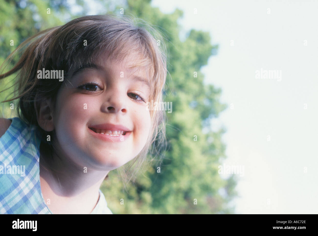 girl child smiling happy outside Stock Photo - Alamy