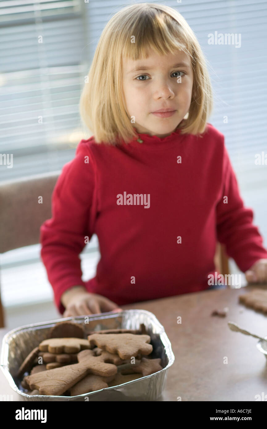 3 year old girl making cookies Stock Photo - Alamy