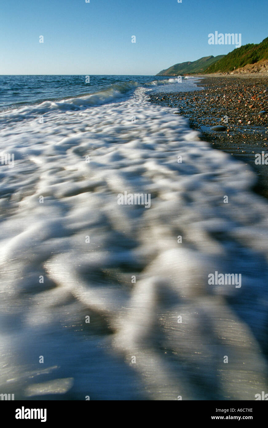 Foaming beach waves hi-res stock photography and images - Alamy