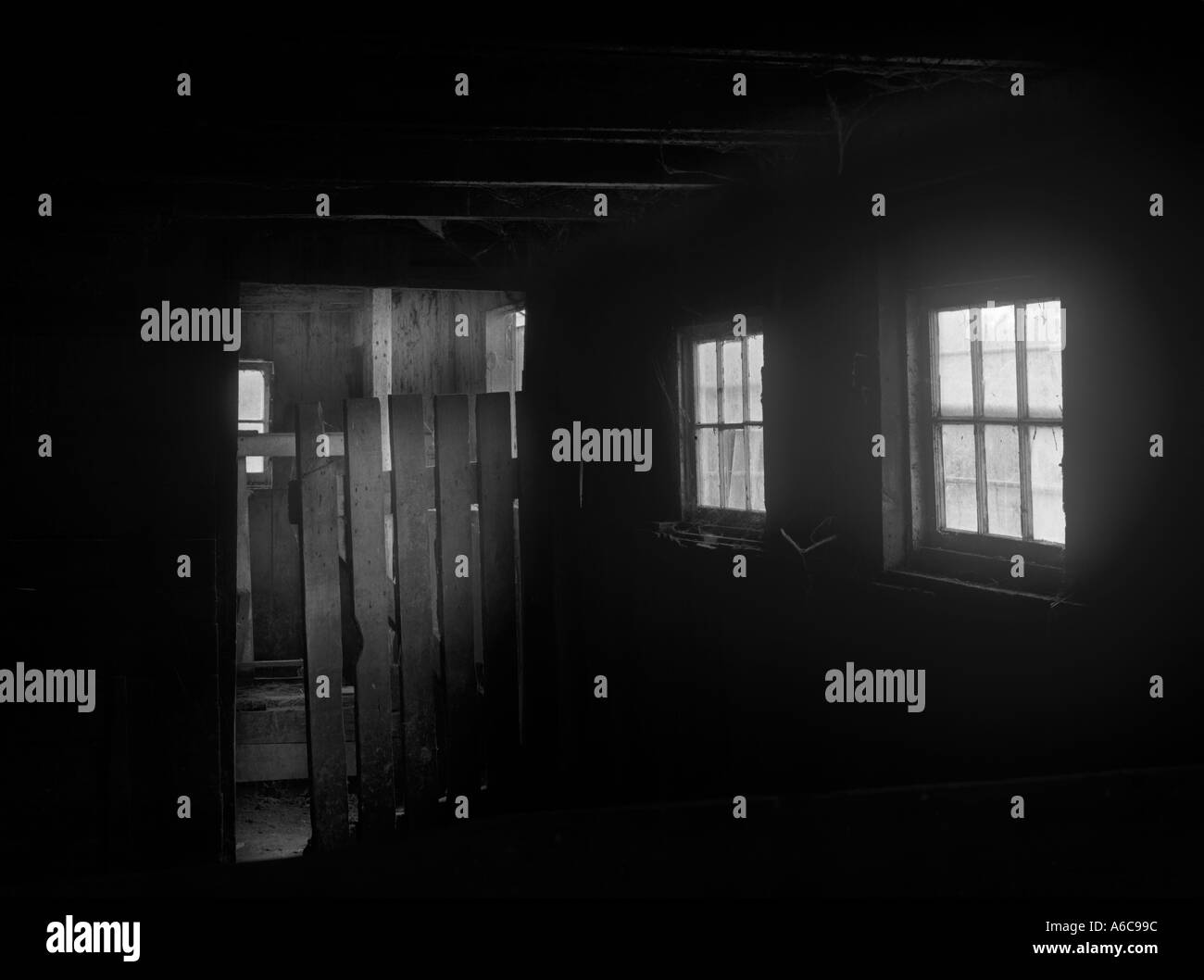 Windows in interior of old barn Stock Photo - Alamy