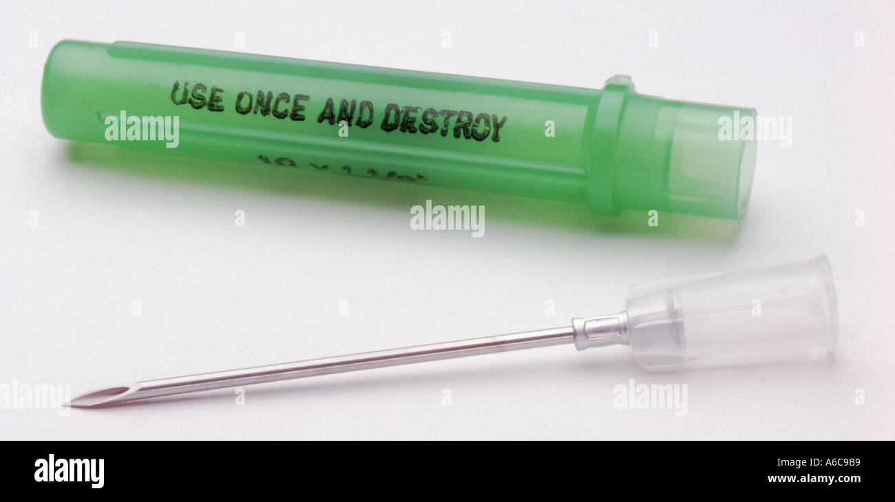 Needle with plastic hub and safety cap Stock Photo - Alamy