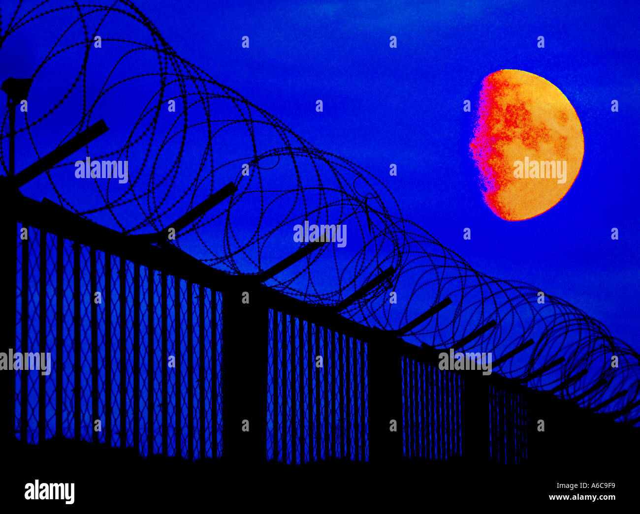 fence fence post spike barb barrier Stock Photo - Alamy