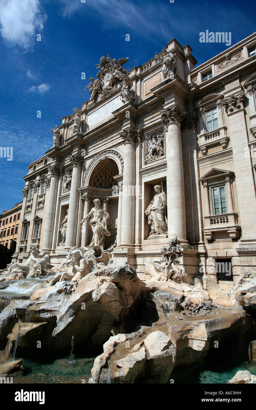 Side view of the Trevi Fountain in Rome under a blue sky Stock Photo ...