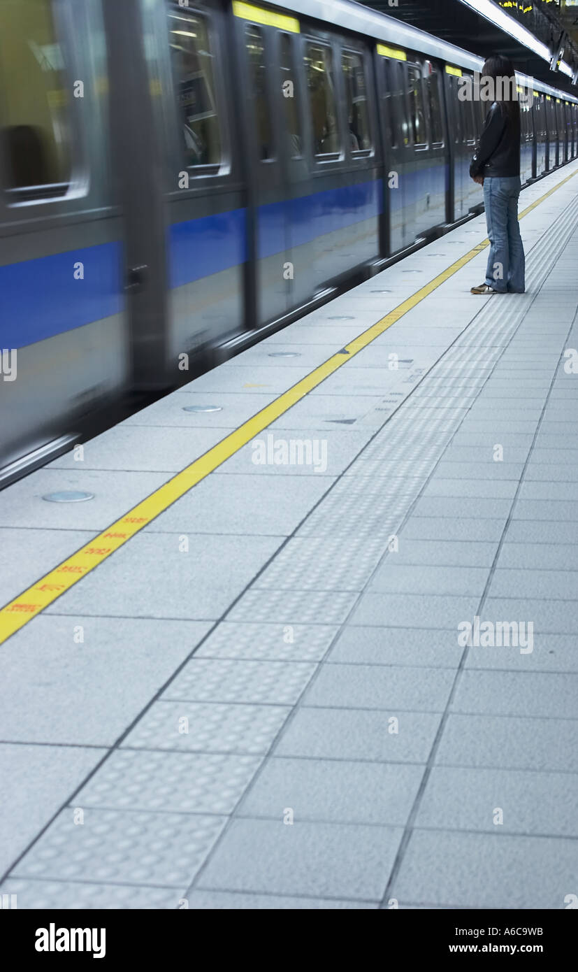 Woman Waiting For Train, Taipei MRT Stock Photo - Alamy