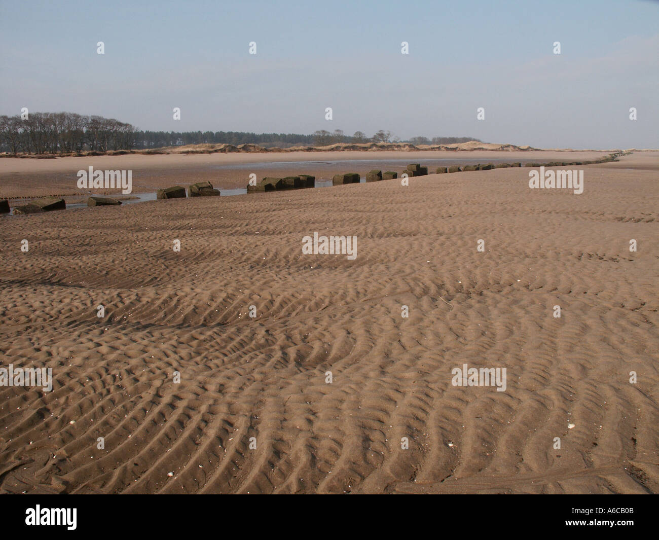 Beach with tank traps Stock Photo - Alamy