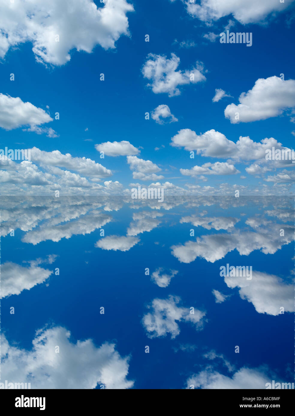 Clouds mirror reflection on the surface Stock Photo - Alamy