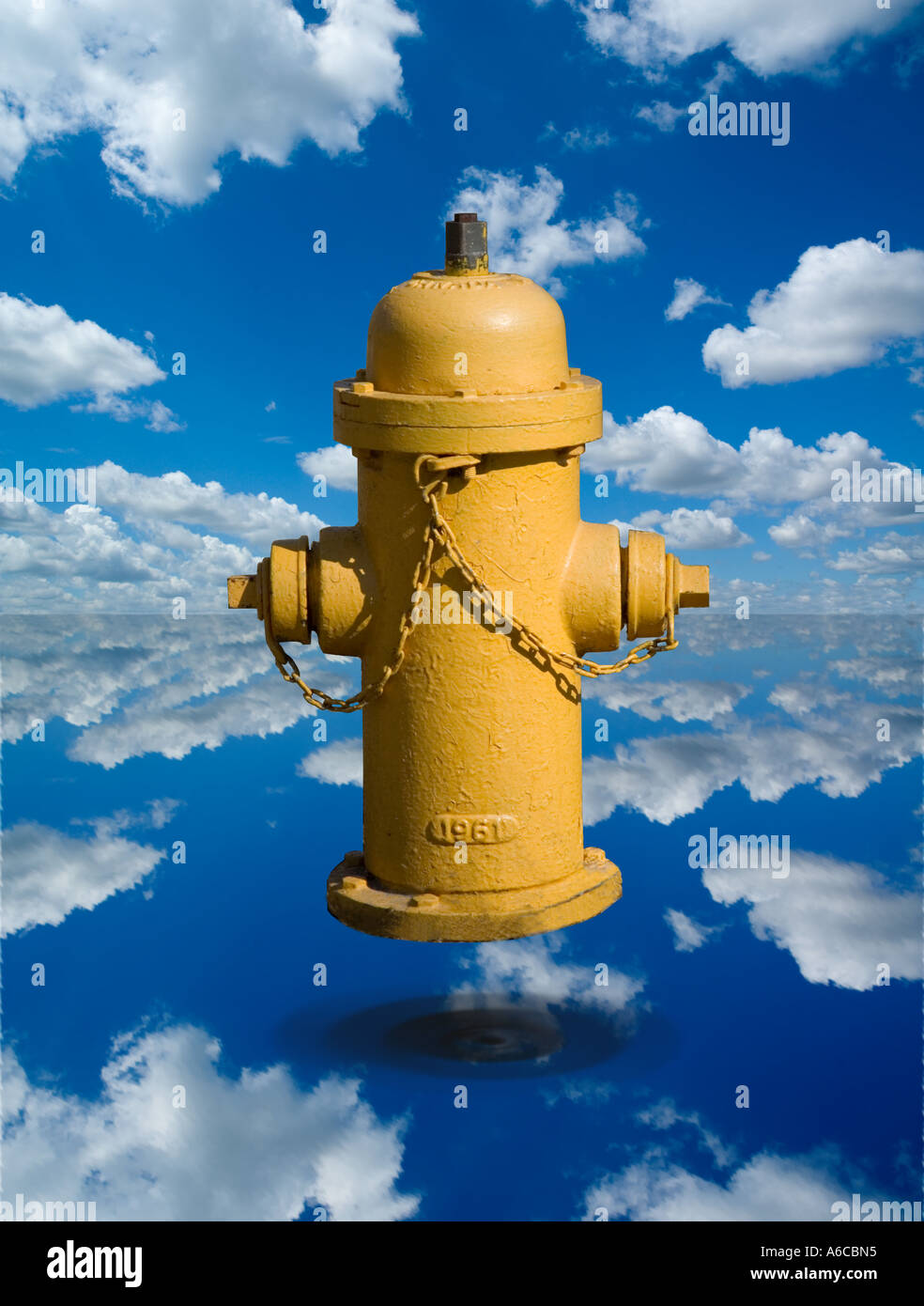 Yellow fire hydrant floating in the clouds Stock Photo - Alamy