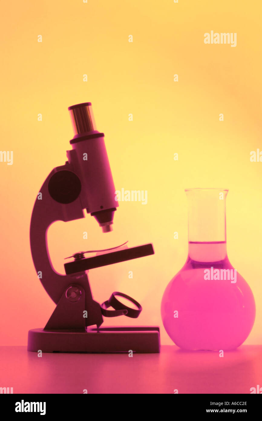 Simple microscope and flask Stock Photo - Alamy