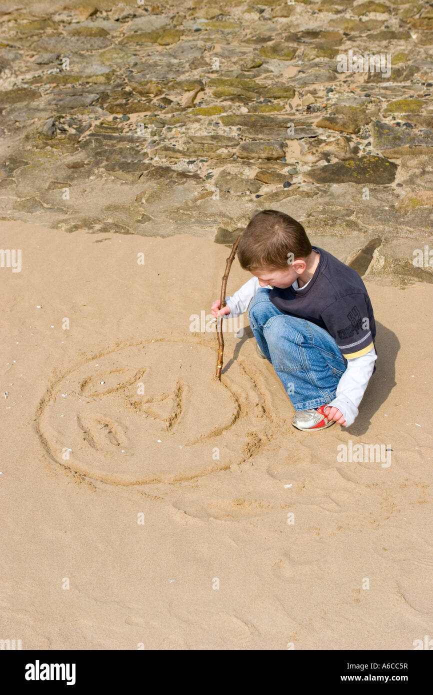 Stick writing in sand hi-res stock photography and images - Alamy