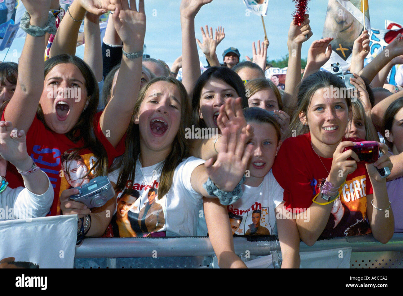 Young female fans at Open Air Pop Concert Stock Photo - Alamy