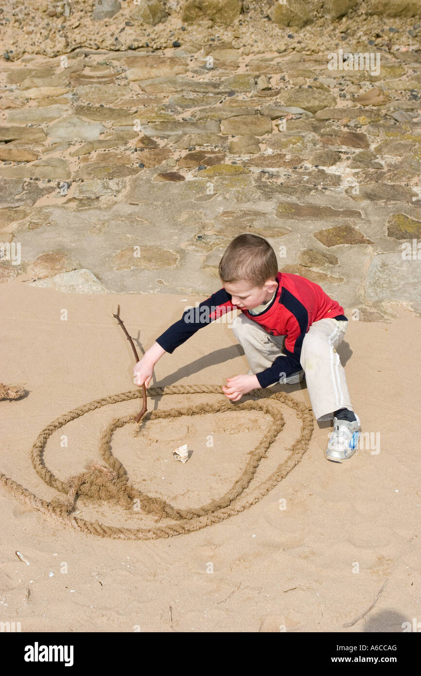 Drawing Sand Stick High Resolution Stock Photography and Images - Alamy