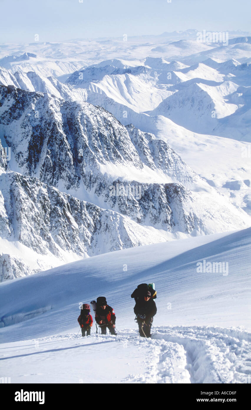A group of climbers is tracking on the mountain range Stock Photo - Alamy
