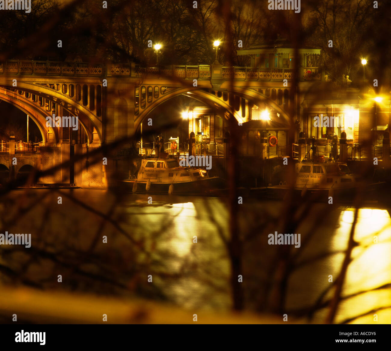 Richmond lock at night with views of the River Thames and the Victorian ...