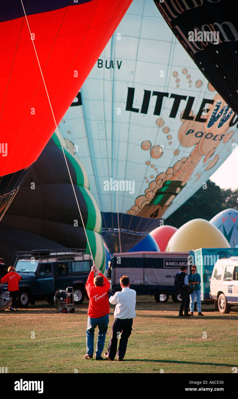Hot air balloon inflation launch Stock Photo - Alamy