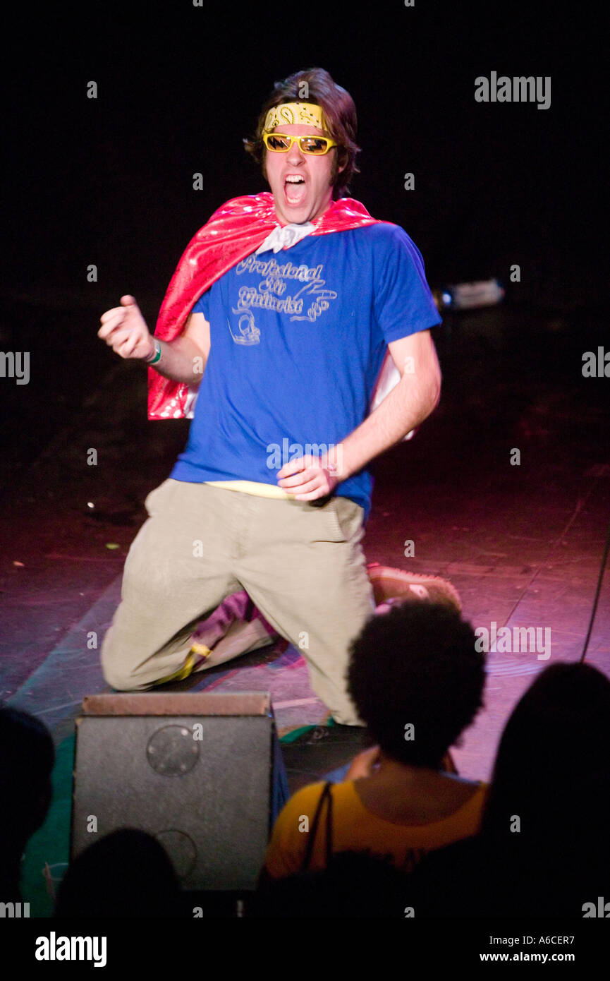 Performers appear on stage in an Air Guitar competition in New York ...