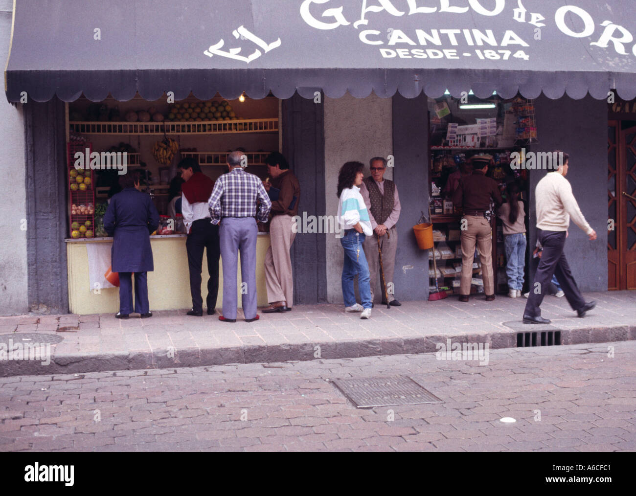 Small shops and customers chatting in Mexico City Stock Photo - Alamy